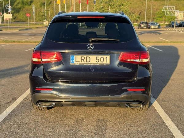 Blue Mercedes-Benz GLC 250 2017 in Vilnius, with an engine capacity of 2.10 L and mileage of 260 thousand km for 18750 €, photo 5 on AUTOMOTO.COM.LV
