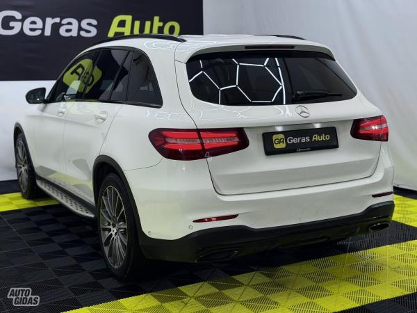 White Mercedes-Benz GLC 250 2015 in Avizieniai, with an engine capacity of 2.10 L and mileage of 428 thousand km for 16990 €, photo 4 on AUTOMOTO.COM.LV