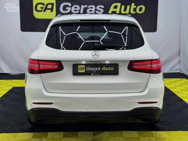 White Mercedes-Benz GLC 250 2015 in Avizieniai, with an engine capacity of 2.10 L and mileage of 428 thousand km for 16990 €, photo 5 on AUTOMOTO.COM.LV