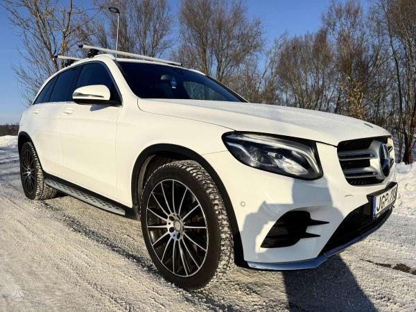 White Mercedes-Benz GLC 250 2016 in Vilnius, with an engine capacity of 1.99 L and mileage of 200 thousand km for 21900 €, photo 2 on AUTOMOTO.COM.LV