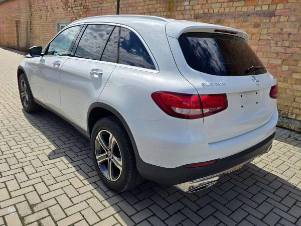 White Mercedes-Benz GLC 300 2019 in Siauliai, with an engine capacity of 2.00 L and mileage of 78 thousand km for 14750 €, photo 2 on AUTOMOTO.COM.LV