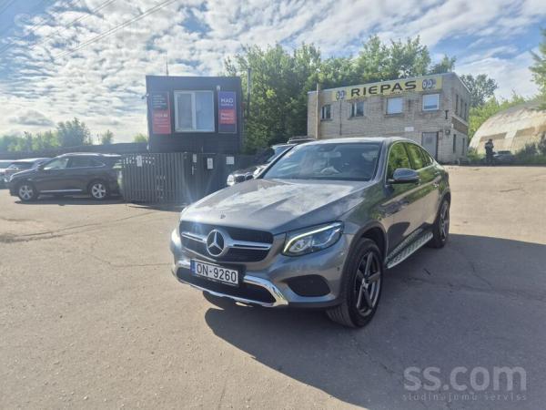 Grey Mercedes-Benz GLC 350 2017 in Riga, with an engine capacity of 2.00 L and mileage of 198 thousand km for 21990 €, photo 1 on AUTOMOTO.COM.LV
