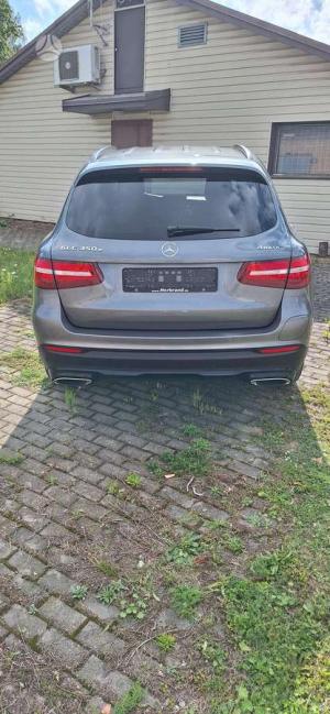 Grey Mercedes-Benz GLC 350 2018 in Marijampole, with an engine capacity of 1.99 L and mileage of 195 thousand km for 15500 €, photo 13 on AUTOMOTO.COM.LV