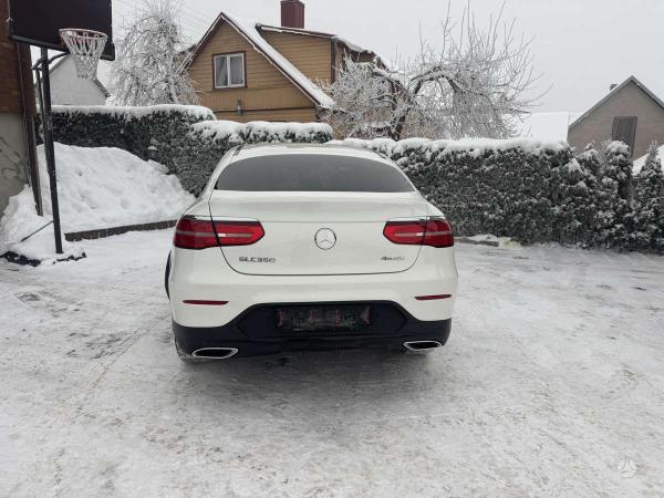 White Mercedes-Benz GLC 350 2018 in Kelme, with an engine capacity of 2.99 L and mileage of 115 thousand km for 29999 €, photo 4 on AUTOMOTO.COM.LV