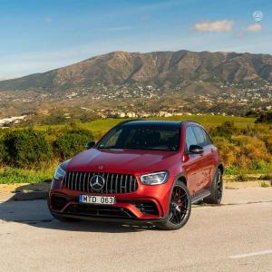 Red Mercedes-Benz GLC 63 AMG 2022 in Vilnius, with an engine capacity of 3.98 L and mileage of 50 thousand km for 59999 €, photo 1 on AUTOMOTO.COM.LV