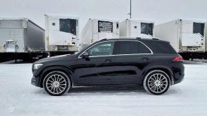 Black Mercedes-Benz GLE 300 2019 in Vilnius, with an engine capacity of 1.95 L and mileage of 233 thousand km for 41990 €, photo 6 on AUTOMOTO.COM.LV