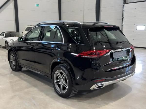 Black Mercedes-Benz GLE 300 2021 in Marupe, with an engine capacity of 2.00 L and mileage of 65 thousand km for 49990 €, photo 3 on AUTOMOTO.COM.LV