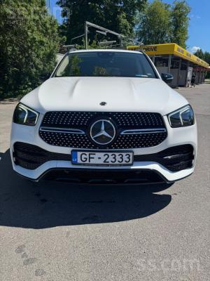 White Mercedes-Benz GLE 300 2022 in Riga, with an engine capacity of 2.00 L and mileage of 55 thousand km for 59950 €, photo 4 on AUTOMOTO.COM.LV
