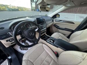 Black Mercedes-Benz GLE 350 2015 in Kaunas, with an engine capacity of 2.99 L and mileage of 300 thousand km for 24900 €, photo 17 on AUTOMOTO.COM.LV