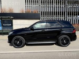 Black Mercedes-Benz GLE 450 AMG 2016 in Riga, with an engine capacity of 3.00 L and mileage of 221 thousand km for 28500 €, photo 16 on AUTOMOTO.COM.LV