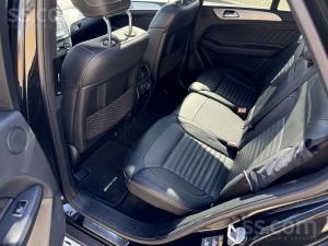 Black Mercedes-Benz GLE 450 AMG 2016 in Riga, with an engine capacity of 3.00 L and mileage of 221 thousand km for 28500 €, photo 20 on AUTOMOTO.COM.LV