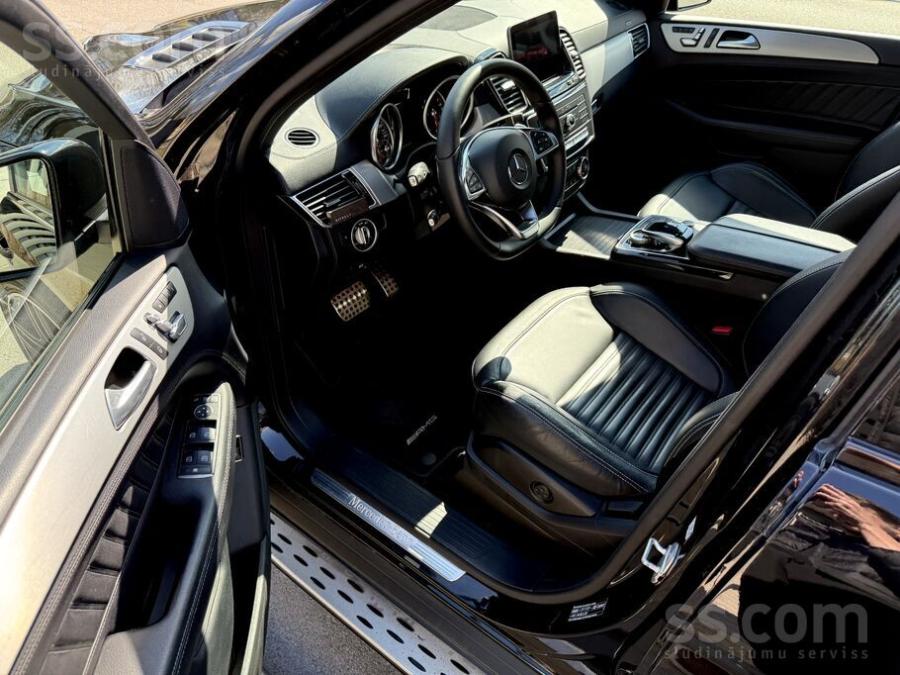 Black Mercedes-Benz GLE 450 AMG 2016 in Riga, with an engine capacity of 3.00 L and mileage of 221 thousand km for 28500 €, photo 21 on AUTOMOTO.COM.LV