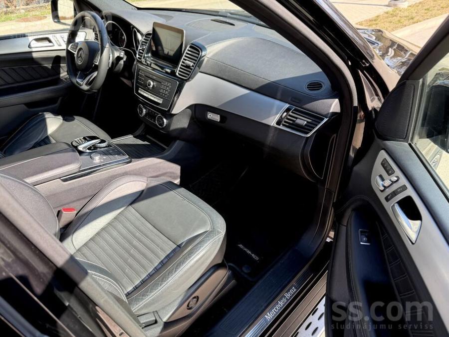 Black Mercedes-Benz GLE 450 AMG 2016 in Riga, with an engine capacity of 3.00 L and mileage of 221 thousand km for 28500 €, photo 23 on AUTOMOTO.COM.LV