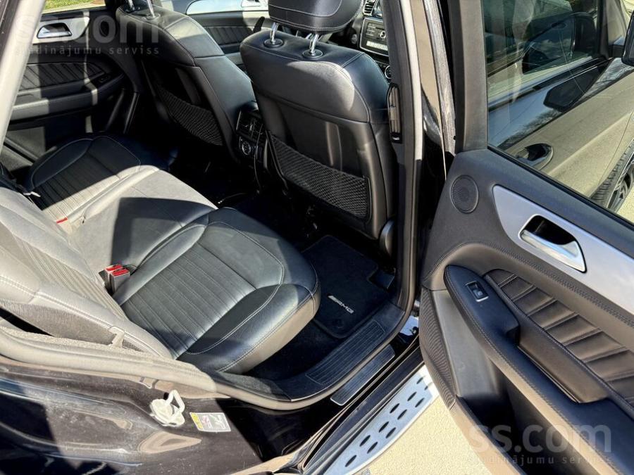 Black Mercedes-Benz GLE 450 AMG 2016 in Riga, with an engine capacity of 3.00 L and mileage of 221 thousand km for 28500 €, photo 24 on AUTOMOTO.COM.LV