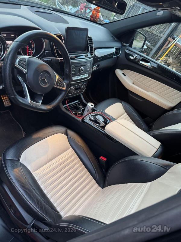 Black Mercedes-Benz GLE-Class 2016 in Tallinn, with an engine capacity of 3.00 L and mileage of 201 thousand km for 28500 €, photo 7 on AUTOMOTO.COM.LV