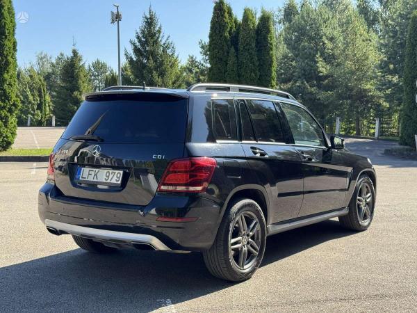 Black Mercedes-Benz glk-200 2013 in Alytus, with an engine capacity of 2.14 L and mileage of 245 thousand km for 10500 €, photo 4 on AUTOMOTO.COM.LV