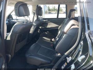 Black Mercedes-Benz GLS 550 2017 in Siauliai, with an engine capacity of 4.70 L and mileage of 144 thousand km for 14990 €, photo 14 on AUTOMOTO.COM.LV