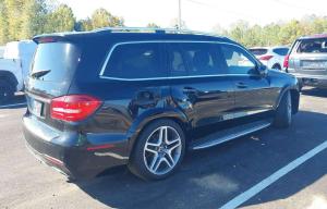 Black Mercedes-Benz GLS 550 2018 in Siauliai, with an engine capacity of 4.70 L and mileage of 184 thousand km for 16900 €, photo 5 on AUTOMOTO.COM.LV