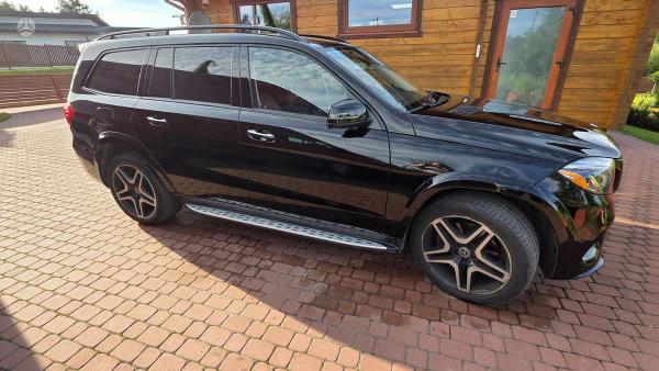 Black Mercedes-Benz GLS 550 2019 in Alytus, with an engine capacity of 4.66 L and mileage of 189 thousand km for 35000 €, photo 3 on AUTOMOTO.COM.LV