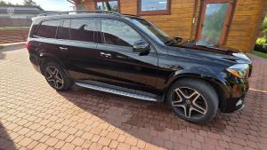 Black Mercedes-Benz GLS 550 2019 in Alytus, with an engine capacity of 4.66 L and mileage of 189 thousand km for 35000 €, photo 4 on AUTOMOTO.COM.LV