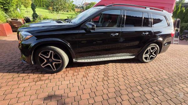 Black Mercedes-Benz GLS 550 2019 in Alytus, with an engine capacity of 4.66 L and mileage of 189 thousand km for 35000 €, photo 4 on AUTOMOTO.COM.LV