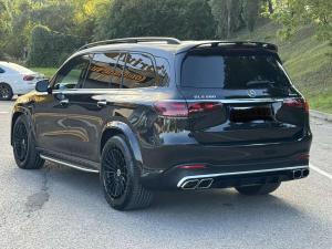 Black Mercedes-Benz gls-580 2021 in Jonava, with an engine capacity of 3.98 L and mileage of 146 thousand km for 69999 €, photo 7 on AUTOMOTO.COM.LV