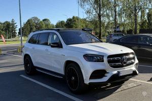 Белый Мерседес gls-580 2020 в Каунас, объемом двигателя 4.00 л и пробегом 92 тыс. км за 68700 €, фото  на AUTOMOTO.COM.LV