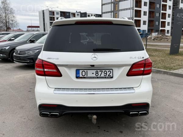 White Mercedes-Benz GLS 63 AMG 2017 in Jelgava, with an engine capacity of 5.50 L and mileage of 125 thousand km for 53500 €, photo 6 on AUTOMOTO.COM.LV