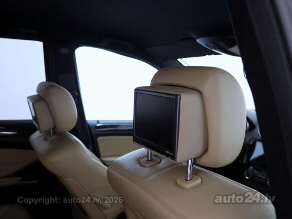 Black Mercedes-Benz M-Class 2008 in Tallinn, with an engine capacity of 3.00 L and mileage of 318 thousand km for 2999 €, photo 8 on AUTOMOTO.COM.LV