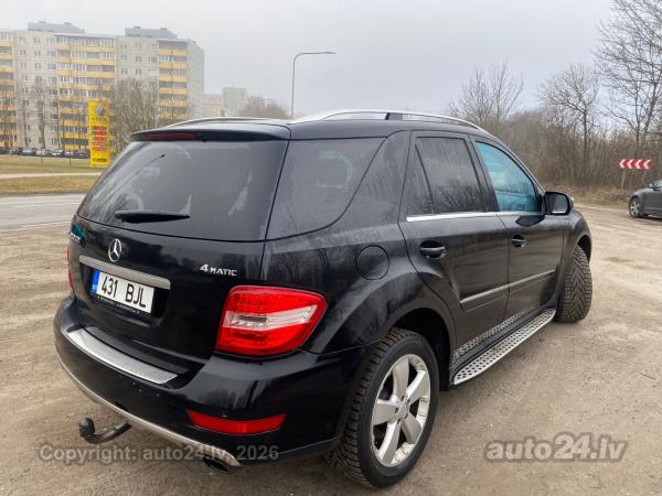 Black Mercedes-Benz M-Class 2009 in Tallinn, with an engine capacity of 3.00 L and mileage of 367 thousand km for 6340 €, photo 5 on AUTOMOTO.COM.LV