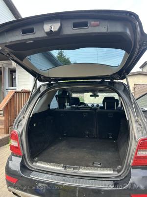 Black Mercedes-Benz M-Class 2009 in Tallinn, with an engine capacity of 3.00 L and mileage of 401 thousand km for 4500 €, photo 7 on AUTOMOTO.COM.LV
