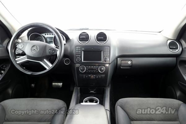 Black Mercedes-Benz M-Class 2009 in Tallinn, with an engine capacity of 3.00 L and mileage of 406 thousand km for 3799 €, photo 6 on AUTOMOTO.COM.LV