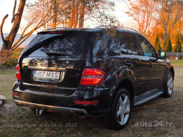 Black Mercedes-Benz M-Class 2010 in Tallinn, with an engine capacity of 3.00 L and mileage of 256 thousand km for 7498 €, photo 6 on AUTOMOTO.COM.LV