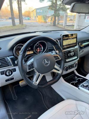 Melns Mercedes-Benz M-Class 2012 Tallina, ar dzinēja tilpumu 5.50 L un nobraukumu 265 tūkst. km par 28000 €, foto 9 vietnē AUTOMOTO.COM.LV