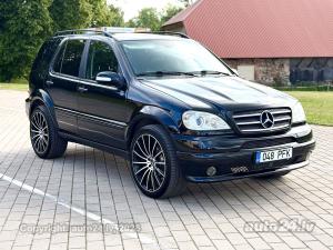 Black Mercedes-Benz M-Class 2006 in Tallinn, with an engine capacity of 5.40 L and mileage of 211 thousand km for 7999 €, photo 3 on AUTOMOTO.COM.LV