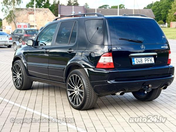 Melns Mercedes-Benz M-Class 2006 Tallina, ar dzinēja tilpumu 5.40 L un nobraukumu 211 tūkst. km par 7999 €, foto 4 vietnē AUTOMOTO.COM.LV
