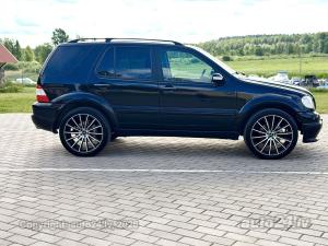 Black Mercedes-Benz M-Class 2006 in Tallinn, with an engine capacity of 5.40 L and mileage of 211 thousand km for 7999 €, photo 6 on AUTOMOTO.COM.LV