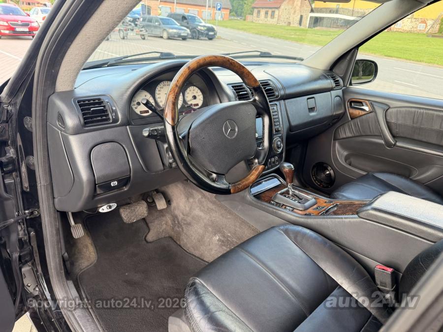 Black Mercedes-Benz M-Class 2006 in Tallinn, with an engine capacity of 5.40 L and mileage of 211 thousand km for 7999 €, photo 10 on AUTOMOTO.COM.LV