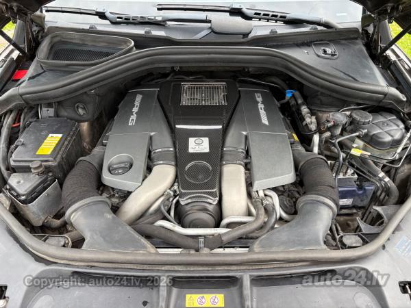 Brown Mercedes-Benz M-Class 2013 in Tallinn, with an engine capacity of 5.50 L and mileage of 240 thousand km for 26990 €, photo 8 on AUTOMOTO.COM.LV
