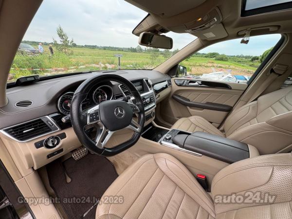 Brown Mercedes-Benz M-Class 2013 in Tallinn, with an engine capacity of 5.50 L and mileage of 240 thousand km for 26990 €, photo 10 on AUTOMOTO.COM.LV