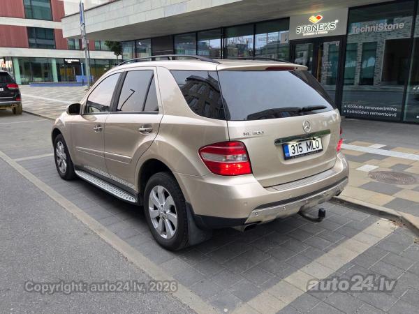 Dzeltens Mercedes-Benz M-Class 2006 Tallina, ar dzinēja tilpumu 5.00 L un nobraukumu 236 tūkst. km par 6900 €, foto 6 vietnē AUTOMOTO.COM.LV
