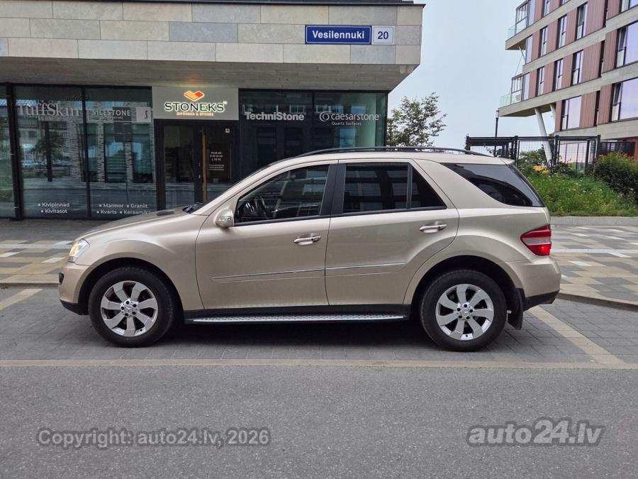 Dzeltens Mercedes-Benz M-Class 2006 Tallina, ar dzinēja tilpumu 5.00 L un nobraukumu 236 tūkst. km par 6900 €, foto 9 vietnē AUTOMOTO.COM.LV