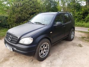 Black Mercedes-Benz ml-230 1998 in Riga, with an engine capacity of 2.30 L and mileage of 320 thousand km for 2500 €, photo  on AUTOMOTO.COM.LV