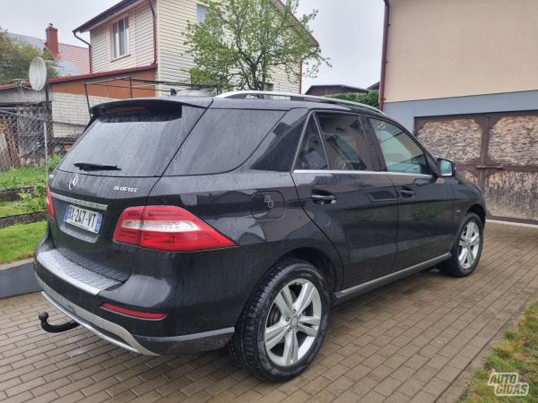 Black Mercedes-Benz ML 250 2011 in Taurage, with an engine capacity of 2.10 L and mileage of 159 thousand km for 12900 €, photo 8 on AUTOMOTO.COM.LV