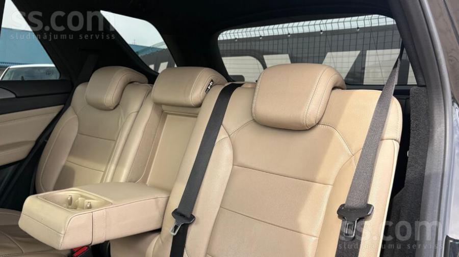Black Mercedes-Benz ML 250 2012 in Liepaja, with an engine capacity of 2.20 L and mileage of 220 thousand km for 14650 €, photo 22 on AUTOMOTO.COM.LV