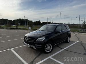 Black Mercedes-Benz ML 250 2015 in Riga, with an engine capacity of 2.20 L and mileage of 250 thousand km for 15250 €, photo 6 on AUTOMOTO.COM.LV