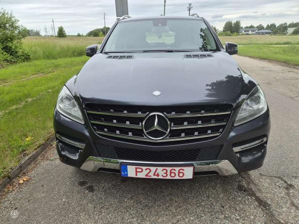 Blue Mercedes-Benz ML 250 2012 in Kaunas, with an engine capacity of 2.14 L and mileage of 263 thousand km for 9900 €, photo 6 on AUTOMOTO.COM.LV