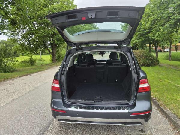 Blue Mercedes-Benz ML 250 2012 in Kaunas, with an engine capacity of 2.14 L and mileage of 263 thousand km for 9900 €, photo 9 on AUTOMOTO.COM.LV