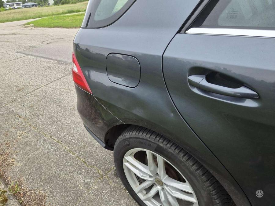 Blue Mercedes-Benz ML 250 2012 in Kaunas, with an engine capacity of 2.14 L and mileage of 263 thousand km for 9900 €, photo 11 on AUTOMOTO.COM.LV