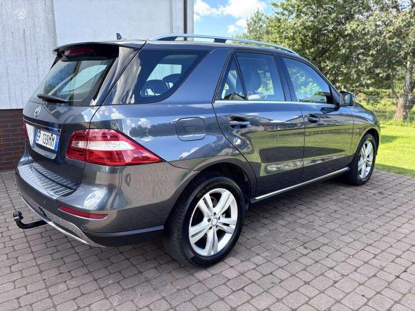 Blue Mercedes-Benz ML 250 2013 in Gargzdai, with an engine capacity of 2.14 L and mileage of 329 thousand km for 12499 €, photo 7 on AUTOMOTO.COM.LV
